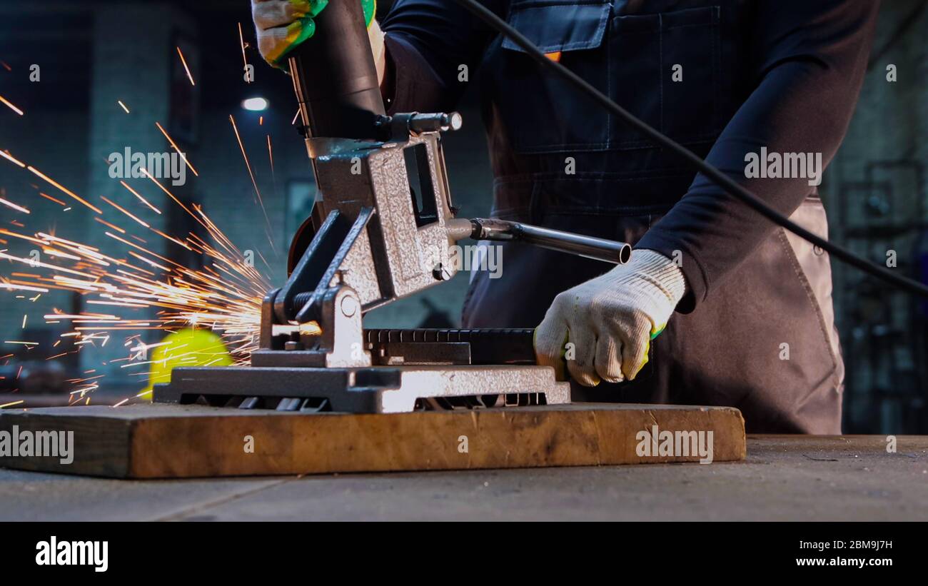Shot young man grinding metal hi-res stock photography and images - Alamy