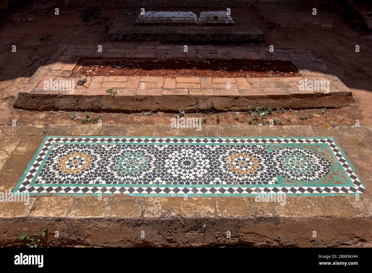 A tiled mosaic grave in a section of the medieval fortified Muslim ...