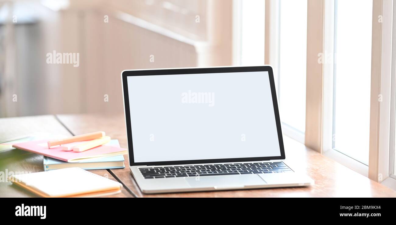 Photo of computer laptop with white blank screen putting on wooden ...