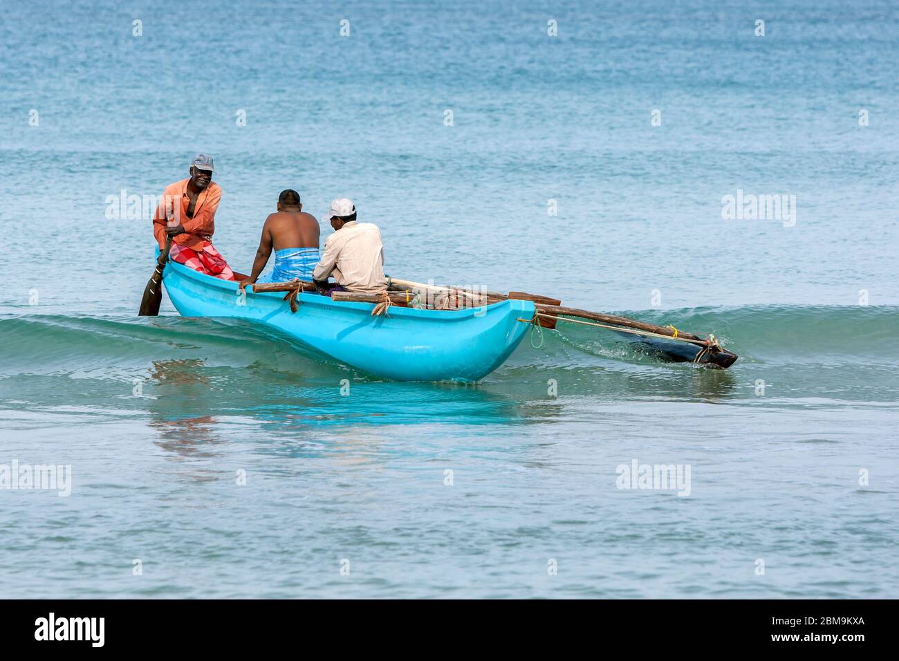 Outrigger paddling hi-res stock photography and images - Alamy