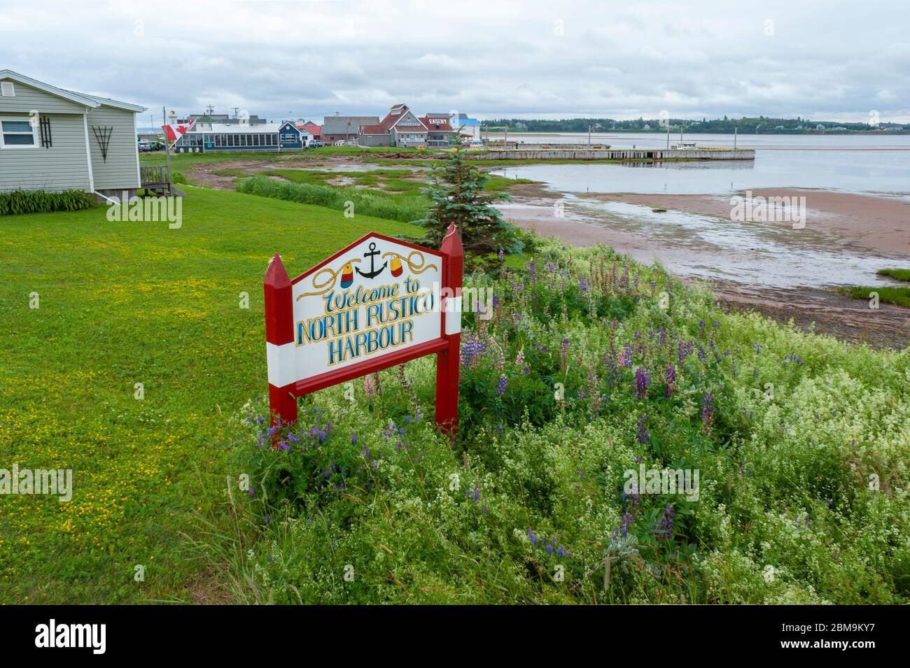 Welcome to North Rustico Harbour. Painted town sign welcoming visitors ...