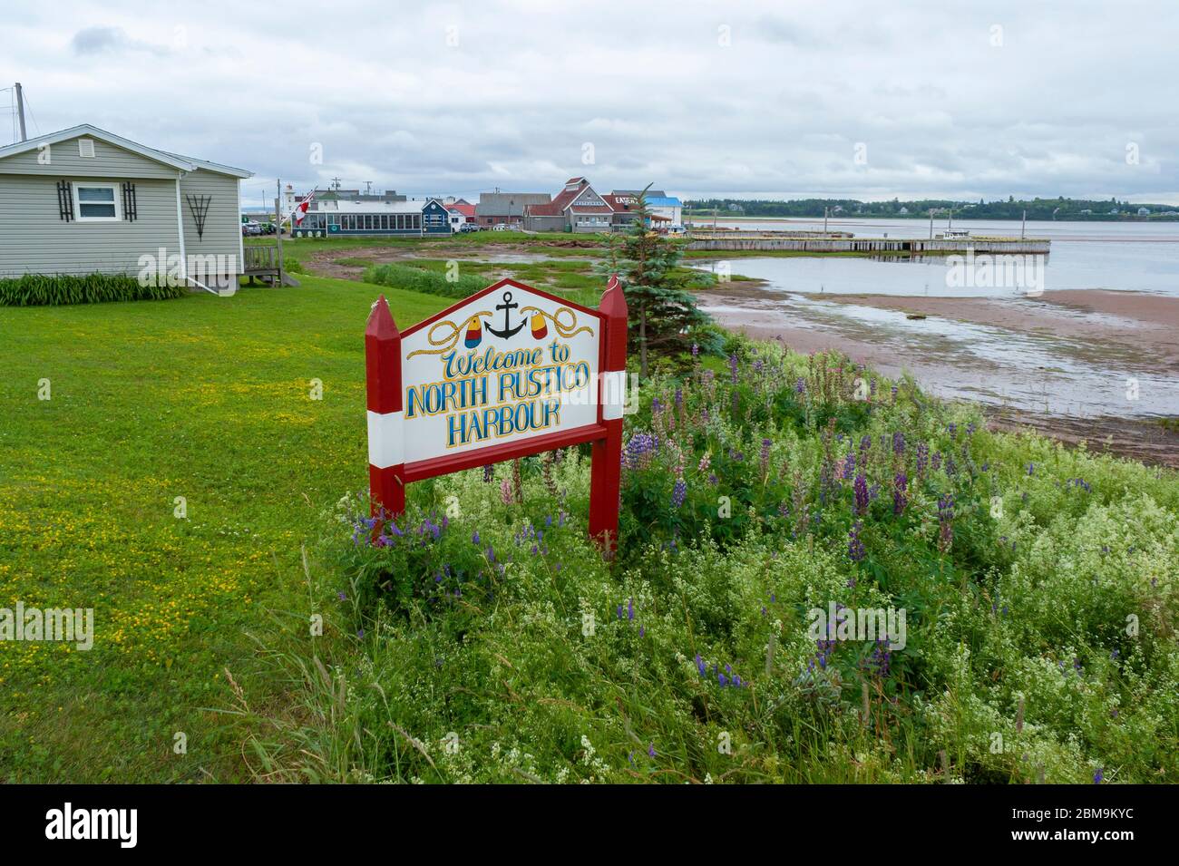 Welcome to North Rustico Harbour. Painted town sign welcoming visitors ...