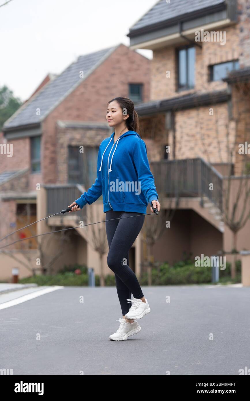 Woman rope jumping outdoor hi-res stock photography and images - Alamy