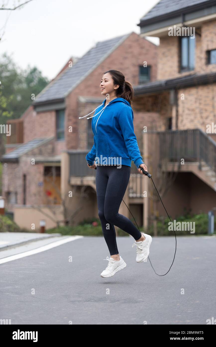 Woman rope jumping outdoor hi-res stock photography and images - Alamy