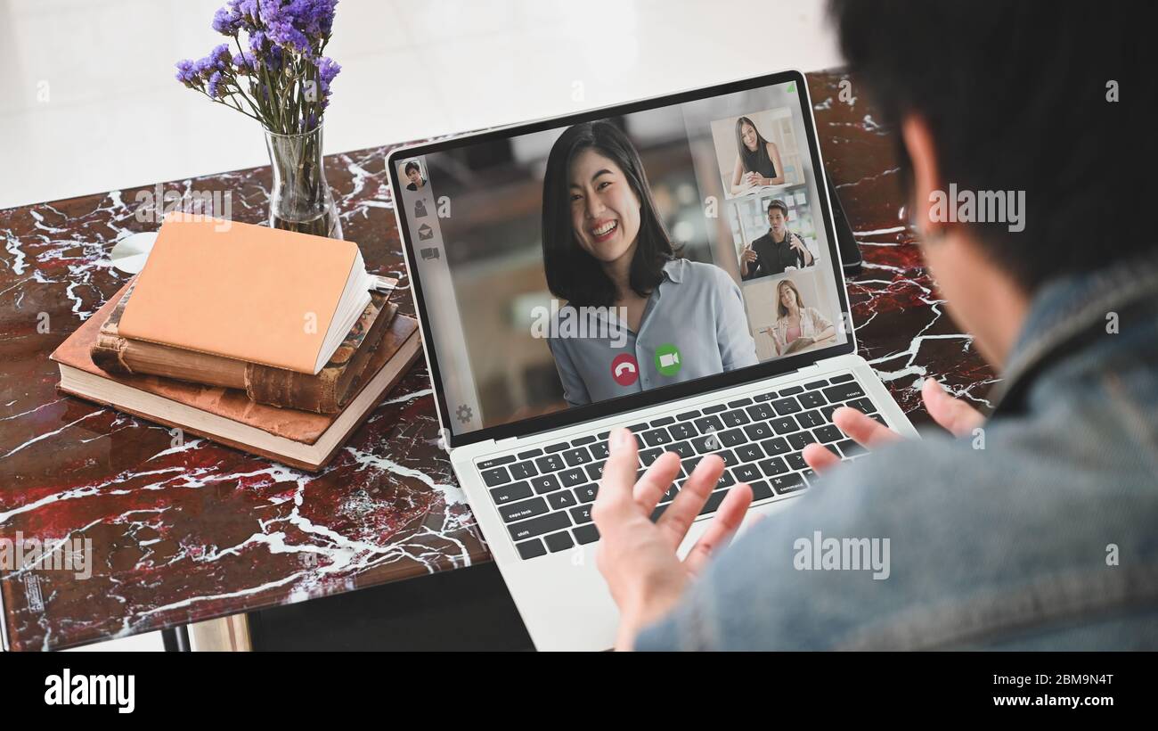 Video calling from the waist up hi-res stock photography and images - Alamy