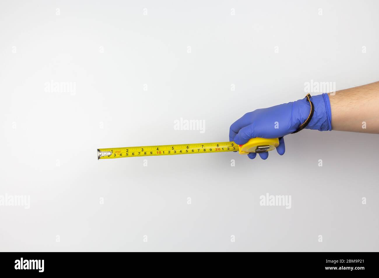 Measuring human hand with ruler hi-res stock photography and images - Alamy