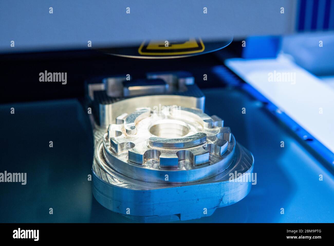 Custom metal part manufactured in CNC milling machine Stock Photo - Alamy