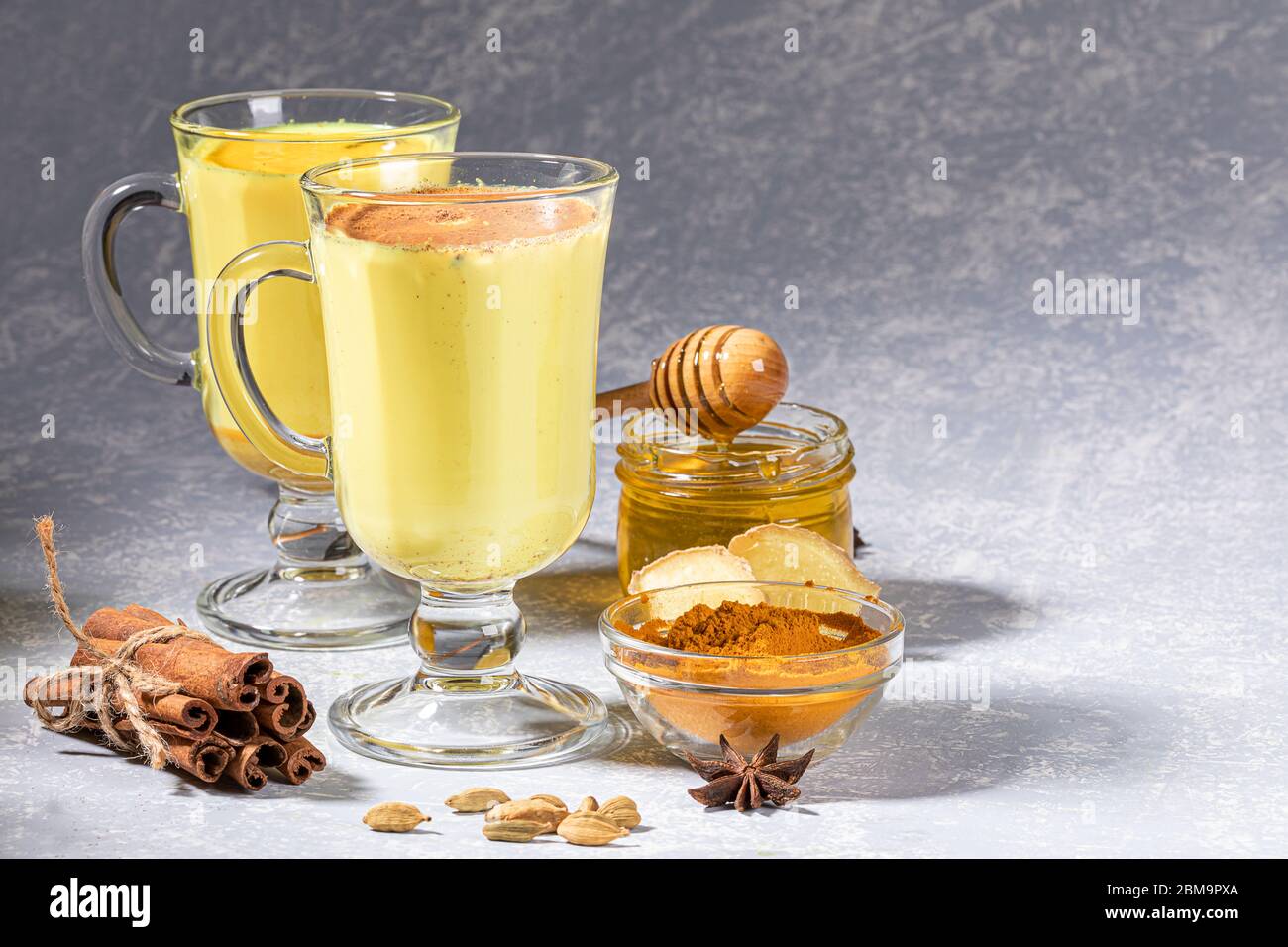 Organic ayurvedic turmeric milk. Two glasses for mulled wine with ...
