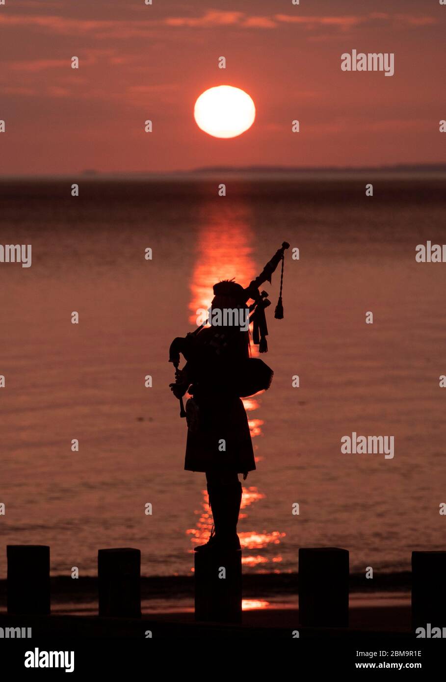 Piper Louise Marshall plays at dawn along Edinburgh's Portobello Beach ...