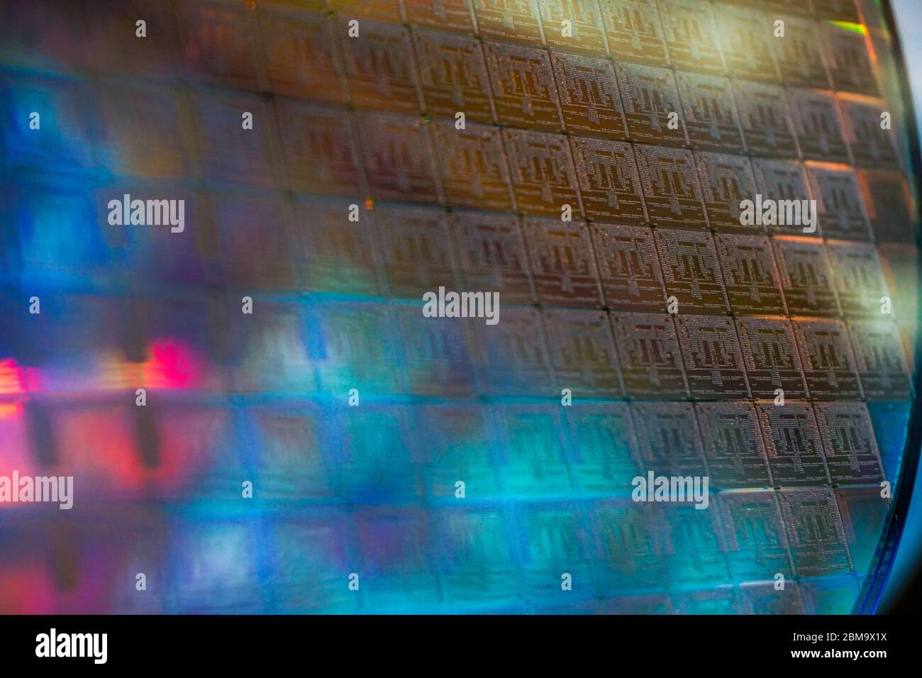 Close up of a silicon wafer of SIM computer chips Stock Photo - Alamy