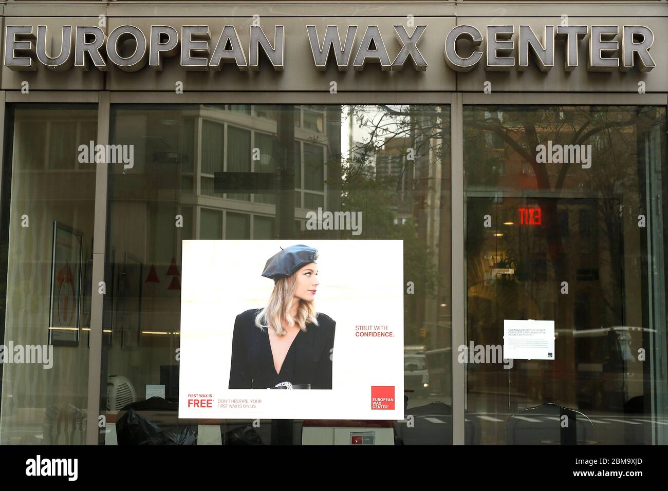 European Wax Center logo is seen on one of their branches Stock Photo ...