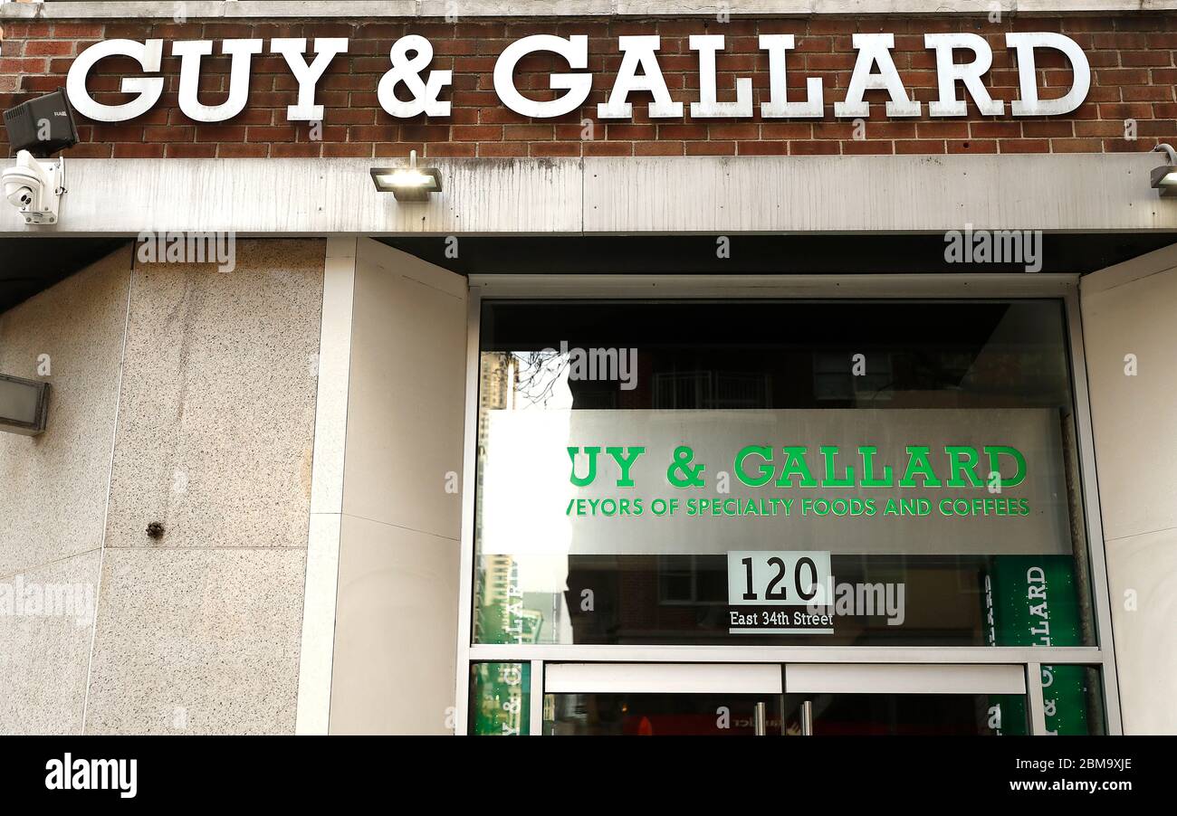 Guy & Gallard logo is seen on one of their branches Stock Photo - Alamy