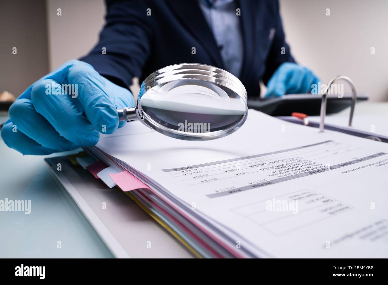 Business Fraud Investigation With Magnifying Glass In Gloves Stock ...
