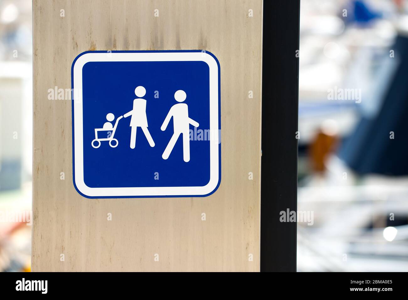 Blue information sign indicating that this area is a public walkway for ...