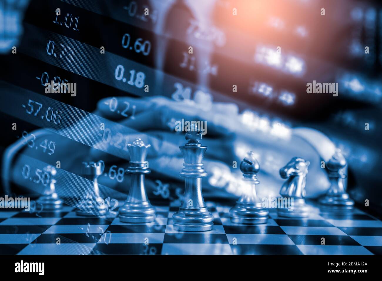 Chess game on chess board on stock market or forex trading graph chart ...
