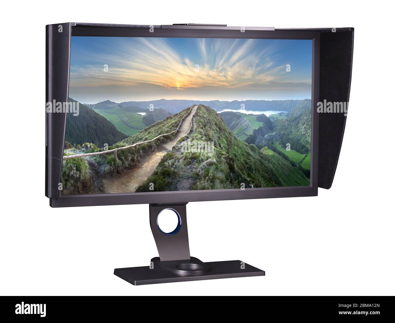 Professional photographer monitor with shading hood isolated on white ...