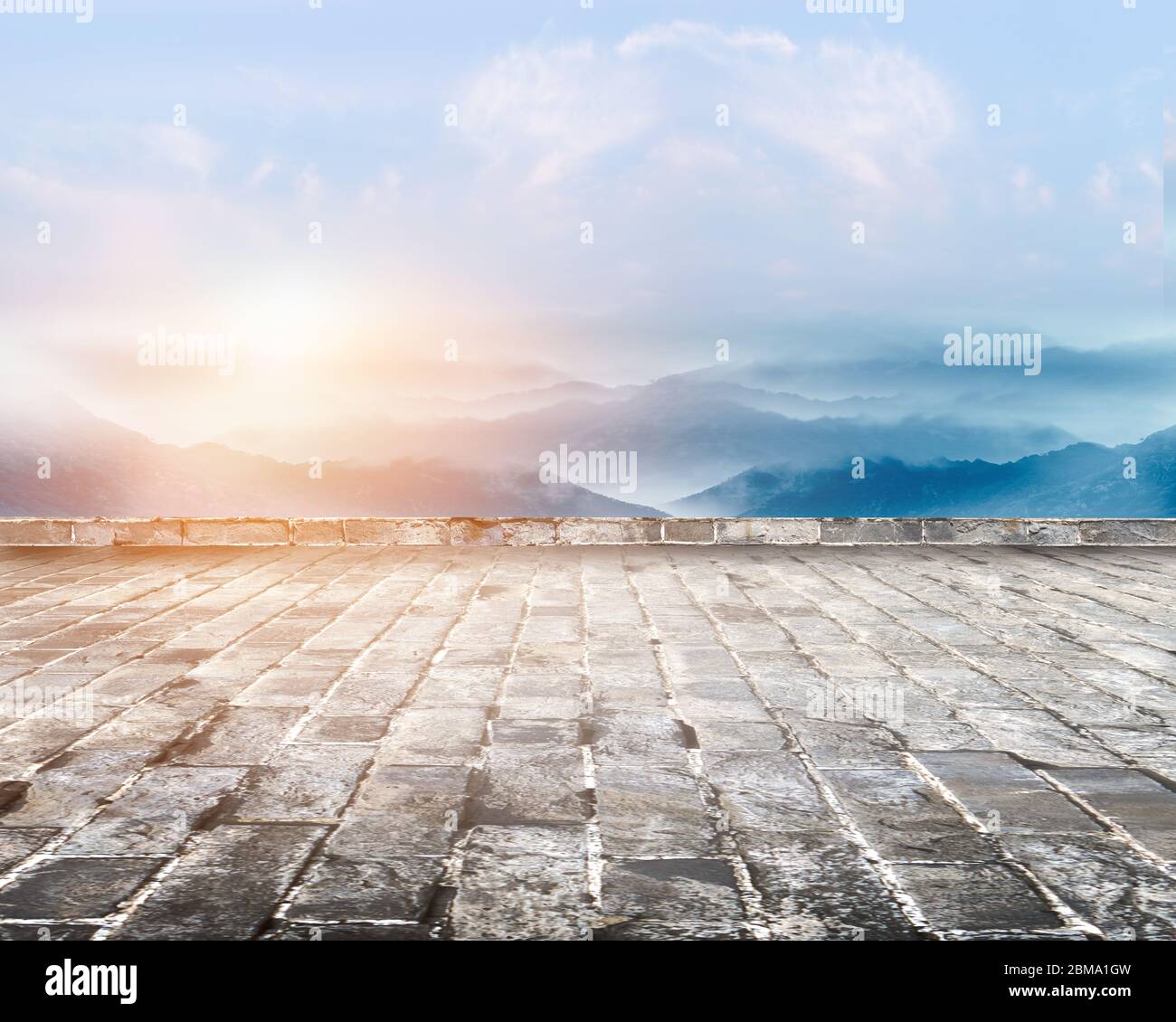 Unmanned floor tile square platform with rolling mountain landscape ...