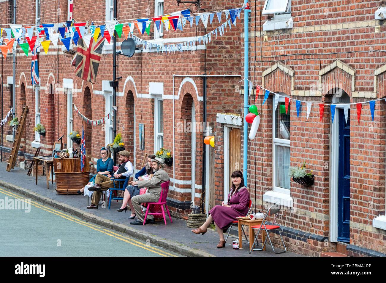 The residents of Cambrian Road in Chester dress up in 1945 clothing and ...