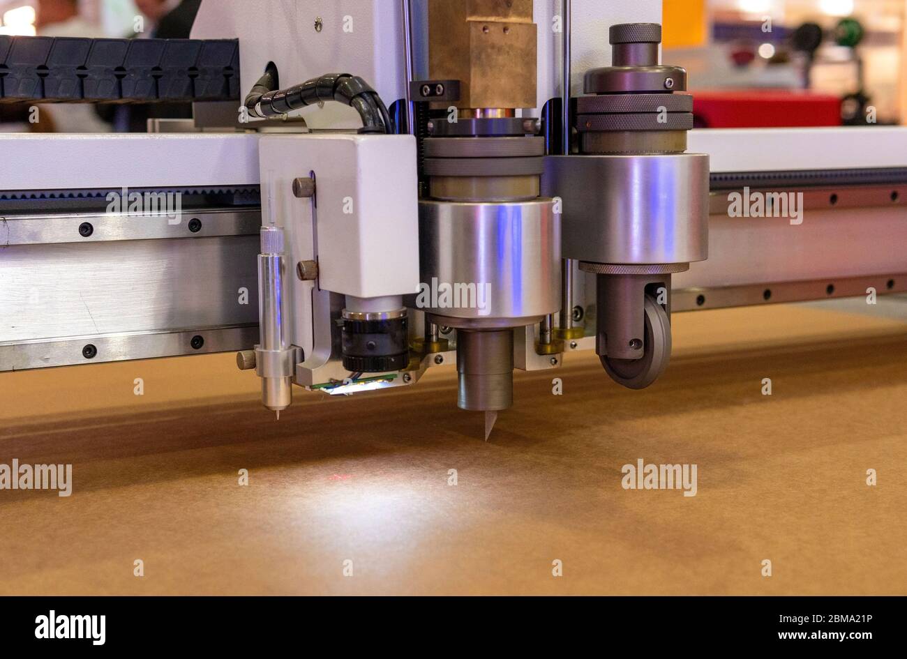 Cutting plotter close-up. The process of cutting Stock Photo - Alamy
