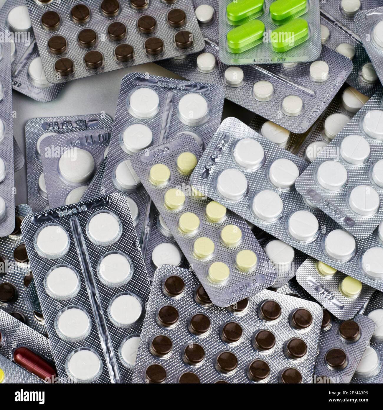 a large number of tablets in blisters top view for backdrop background ...