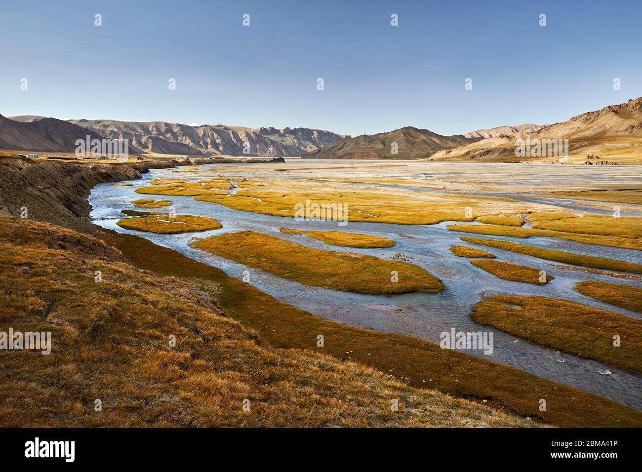 Beautiful scenery of the river in the mountain valley of Kel Suu Lake ...