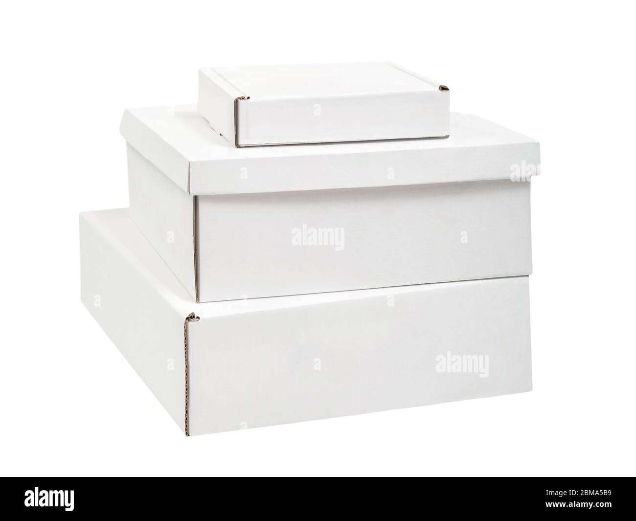 Pile of three blank white cardboard box of different sizes isolated on ...