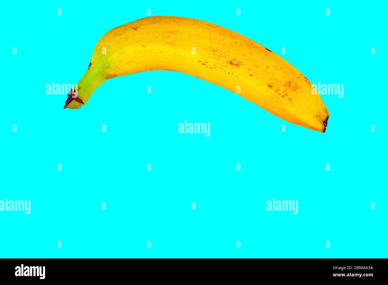 Yellow banana shape on light blue background. Banana Minimal. Pastel ...