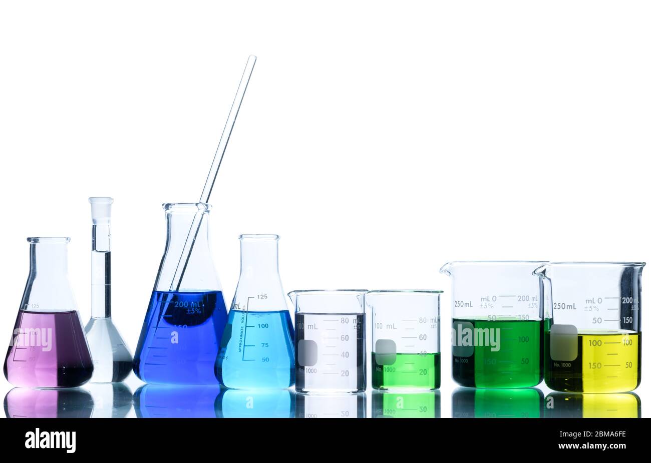 Laboratory glassware with liquids of different colors, Flasks and ...