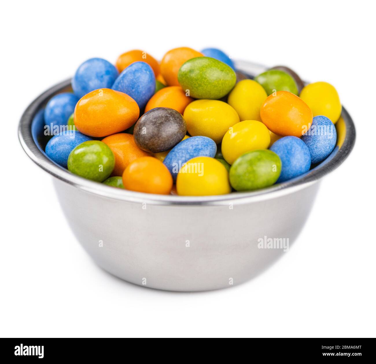 Chocolate coated peanuts isolated on white background (selective focus ...