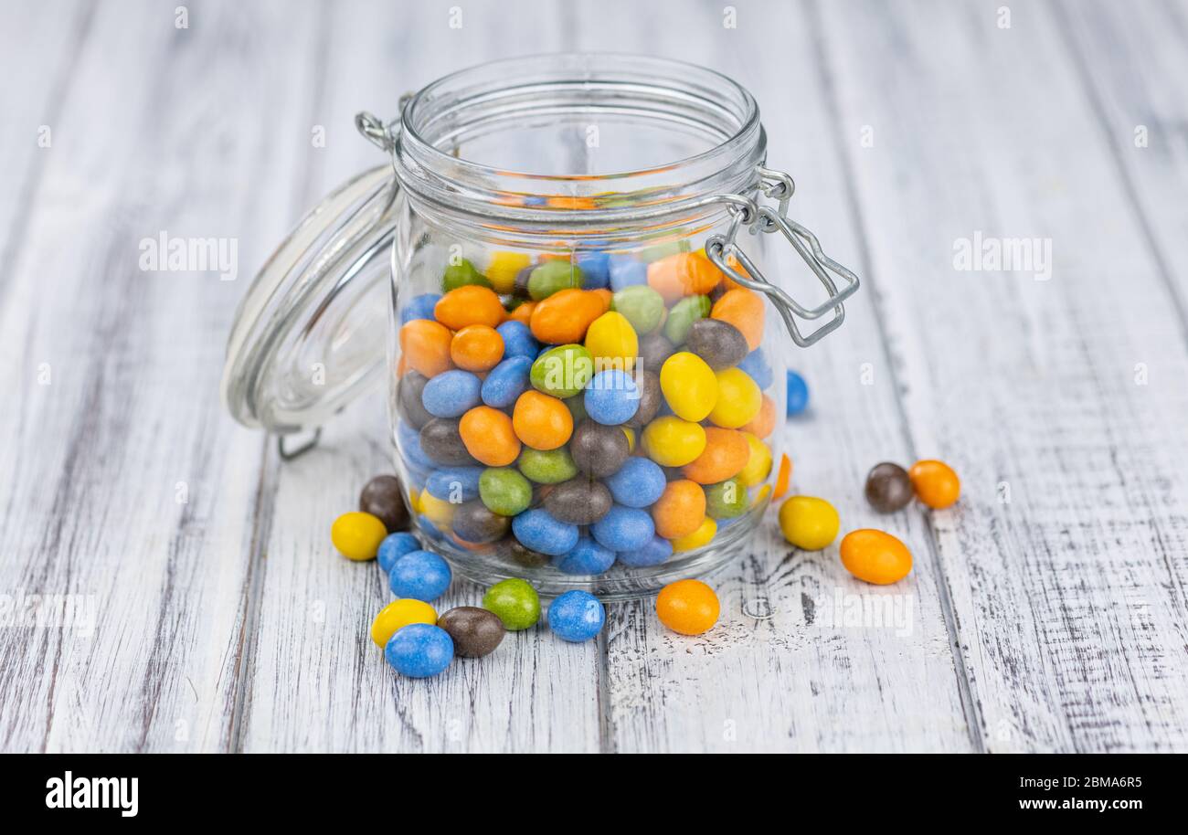 Portion of sweets (chocolate coated peanuts) as detailed close-up shot ...