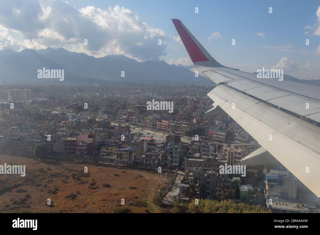Airplane landing at the airport of Kathmandu on Nepal Stock Photo - Alamy