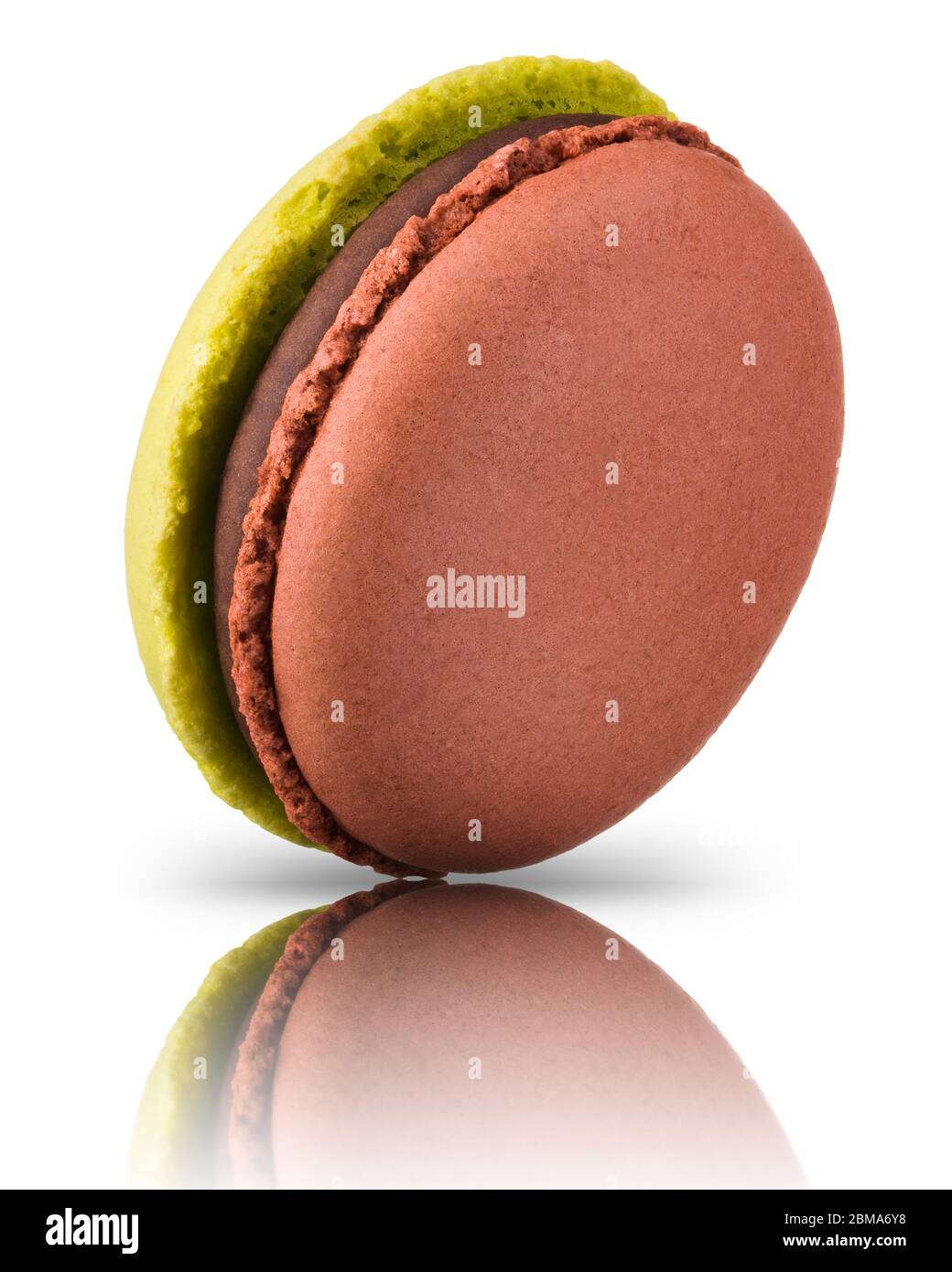 Macro photo of french caramel macaroon or macaron isolated on white ...