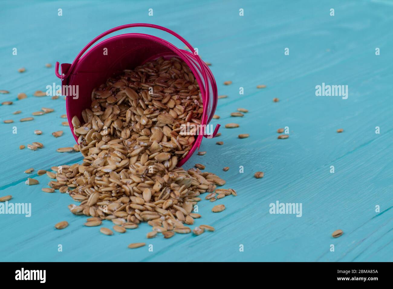 Dry oatmeal poured wooden bowl hi-res stock photography and images - Alamy