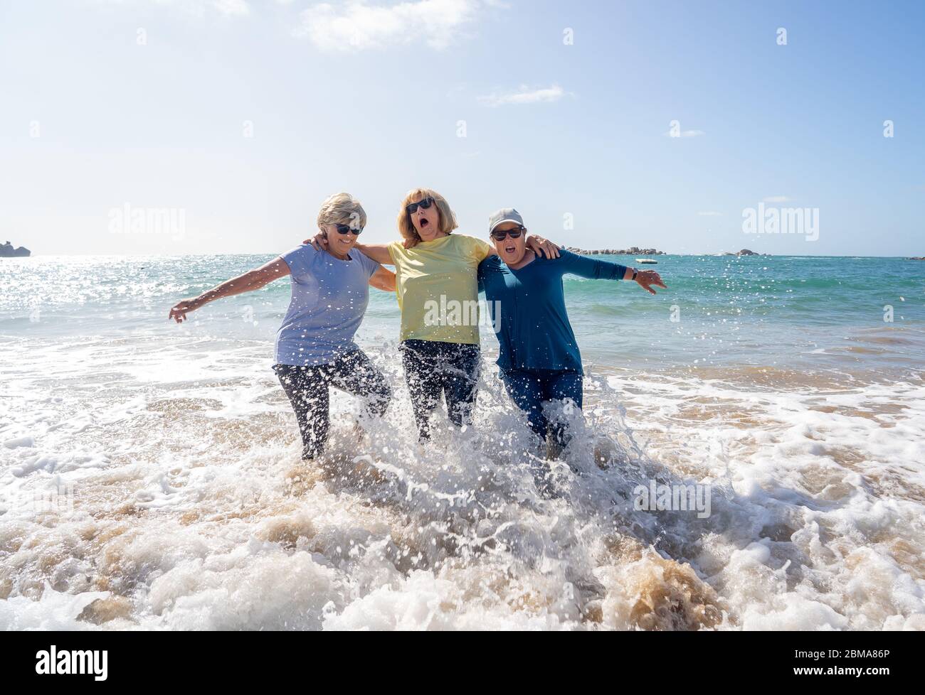 Three older ladies beach hi-res stock photography and images - Alamy