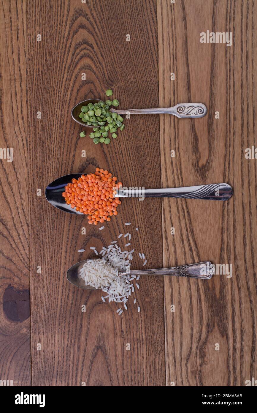 Three teaspoons with different grains Stock Photo - Alamy