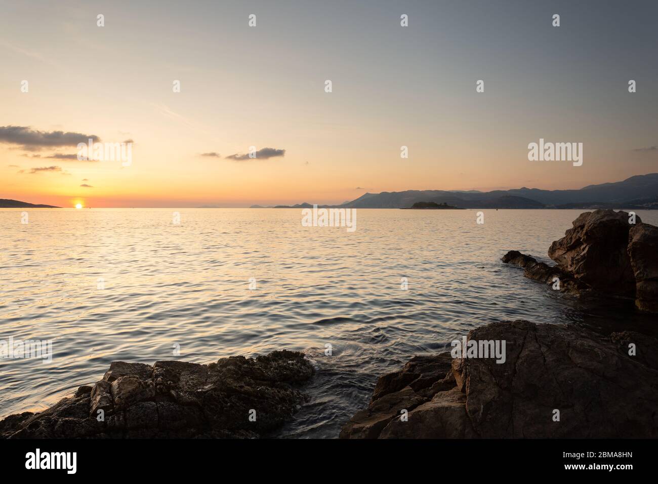 Suset off the coast of Croatia. Looking towards Dubrovnik Stock Photo ...