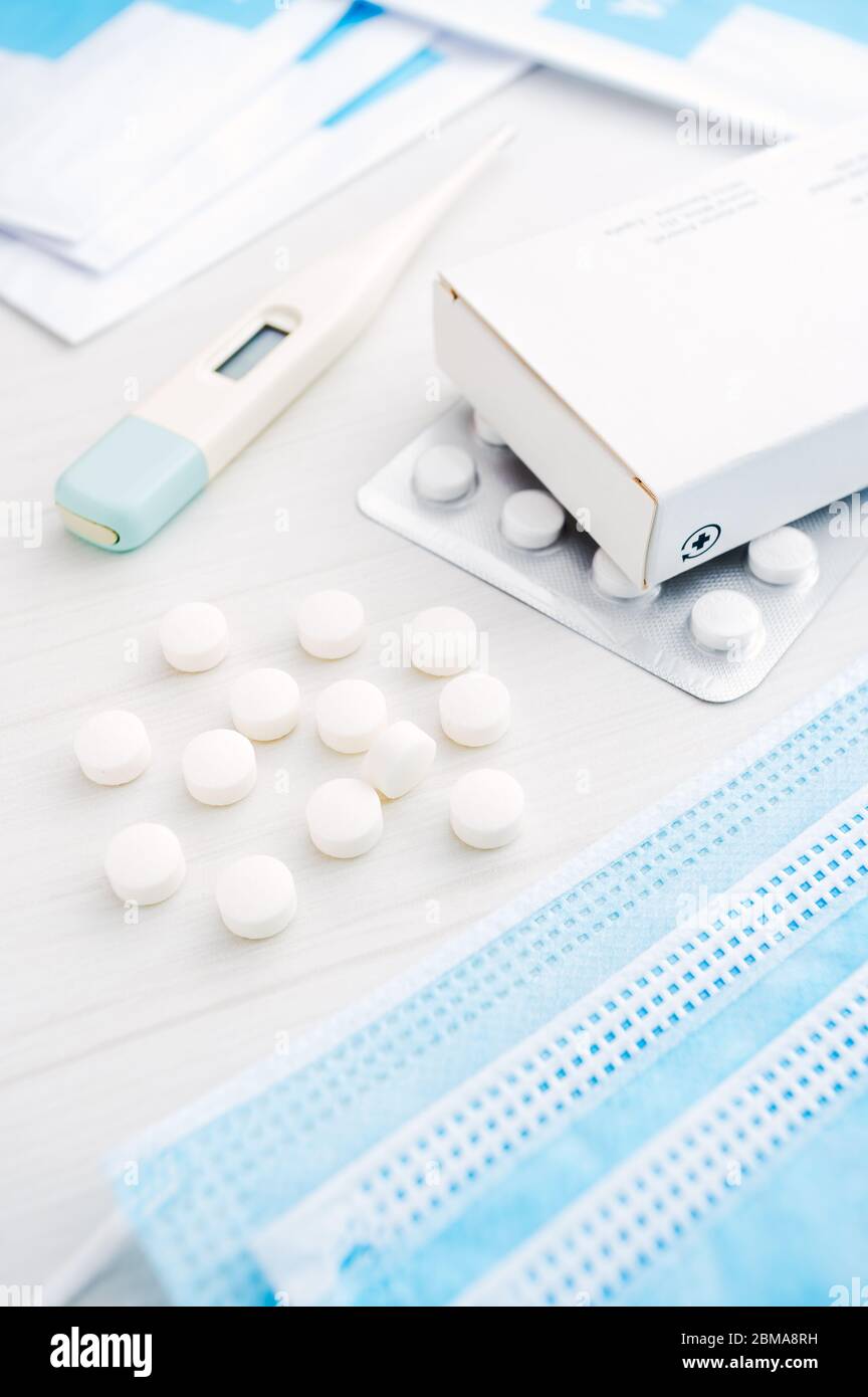 Medicine package, blister, pills, thermometer and face mask for ...