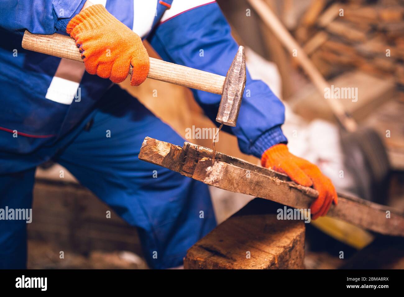 Closeup of repairman in uniform, professional builder working using ...