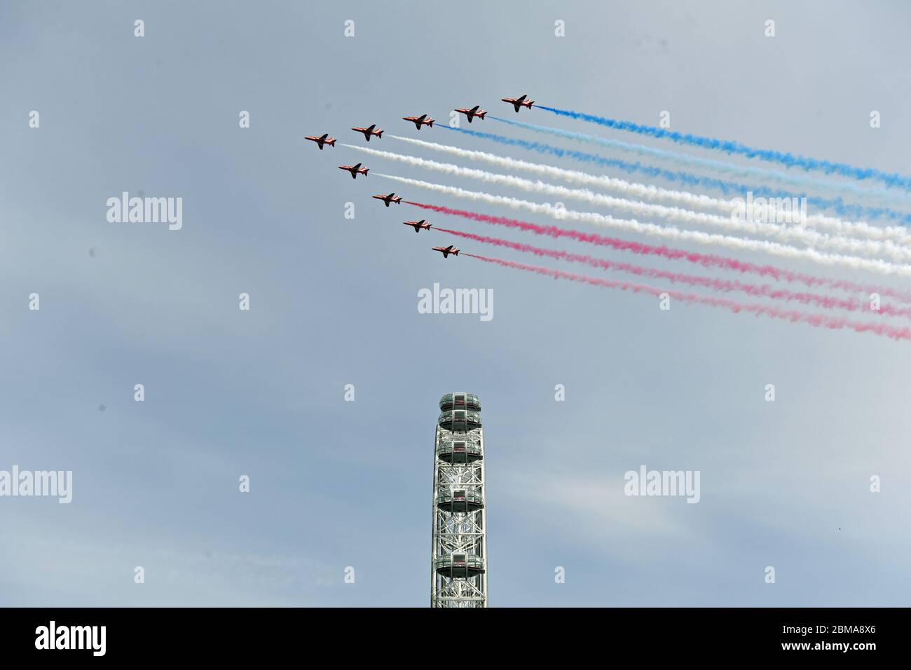 The Royal Air Force Red Arrows pass over the London Eye during a ...