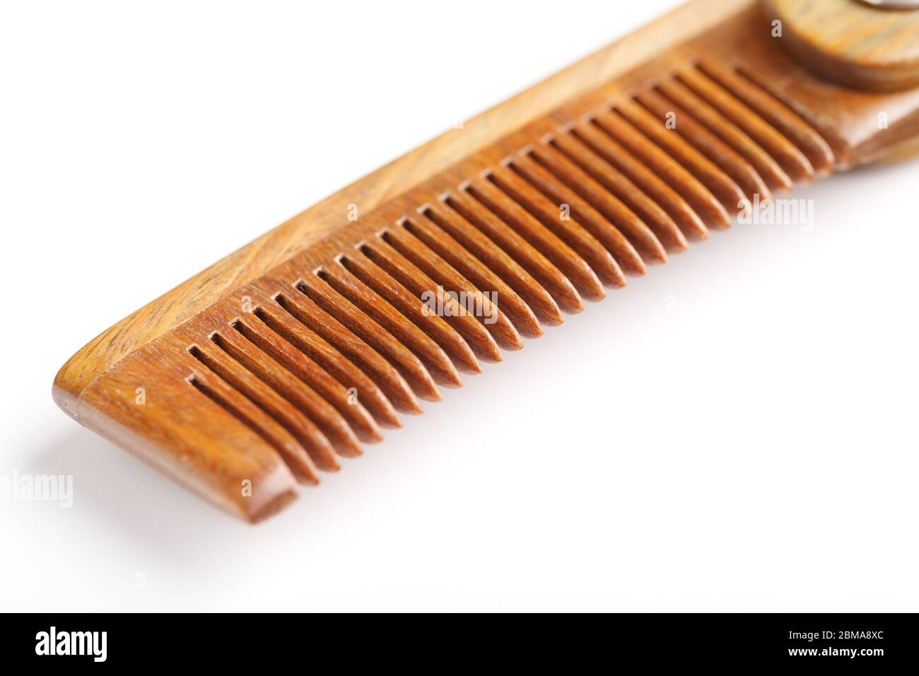 Sandalwood comb on a white background. Hair care. Isolate Stock Photo ...