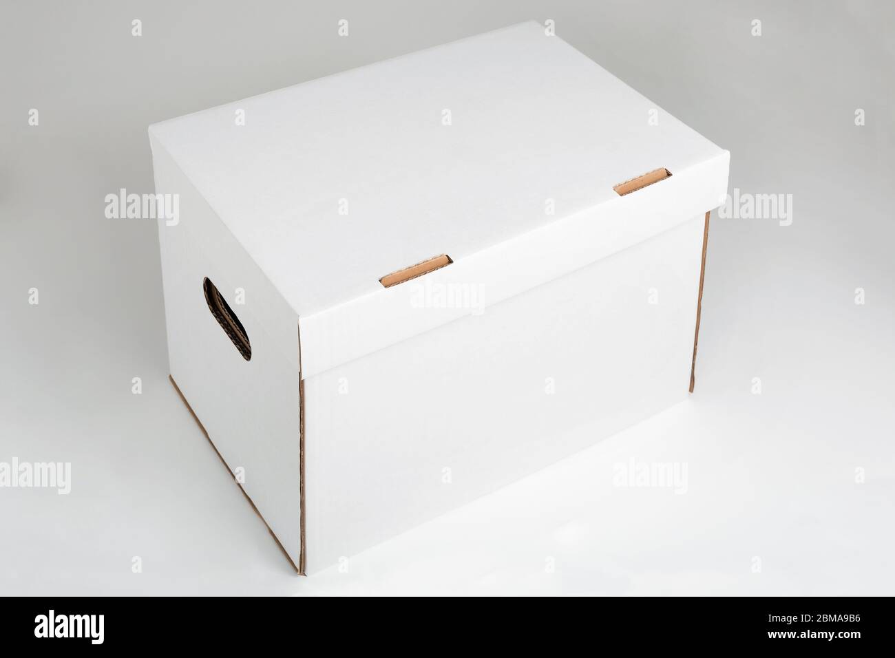 Blank white archive cardboard box Stock Photo - Alamy