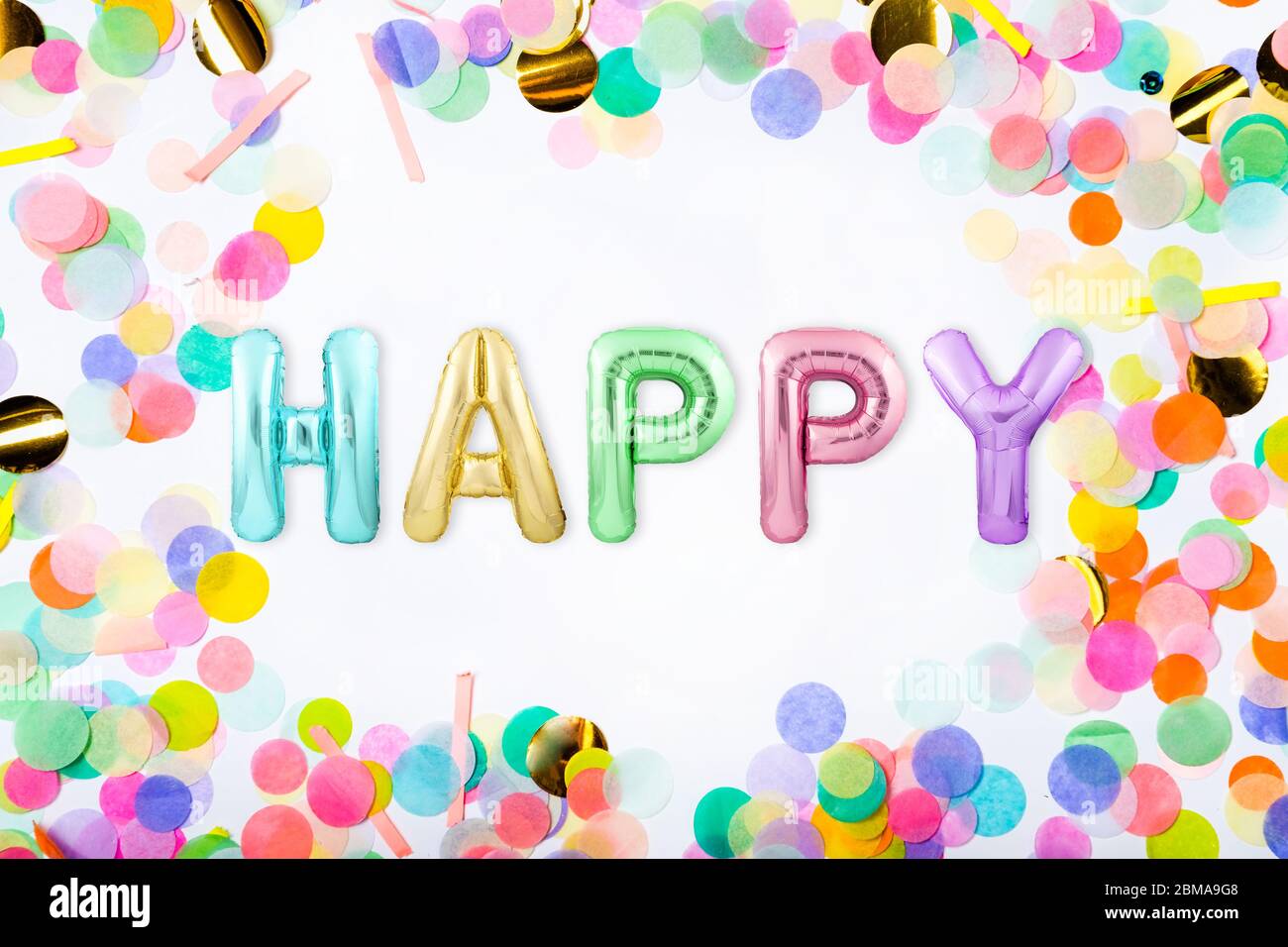 Word HAPPY made of colorful inflatable balloon letters in a frame made ...