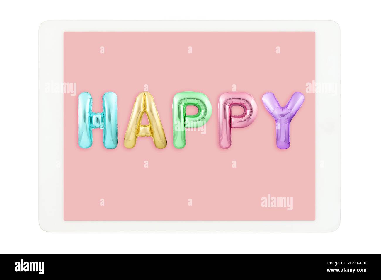 White tablet PC with colorful happy word made of inflatable balloons ...