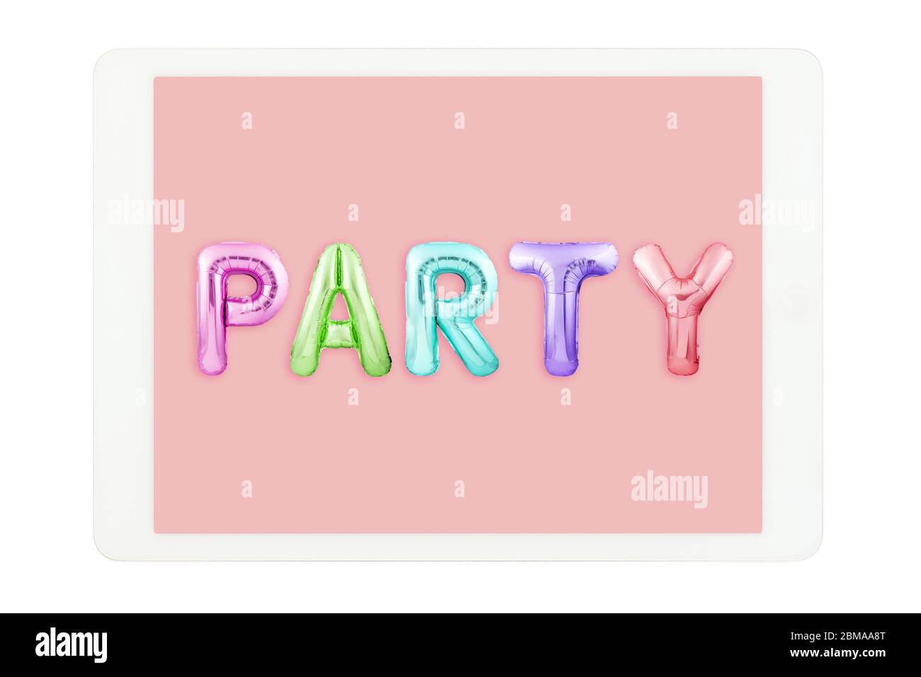 White tablet pc with colorful PARTY word made of inflatable balloons ...
