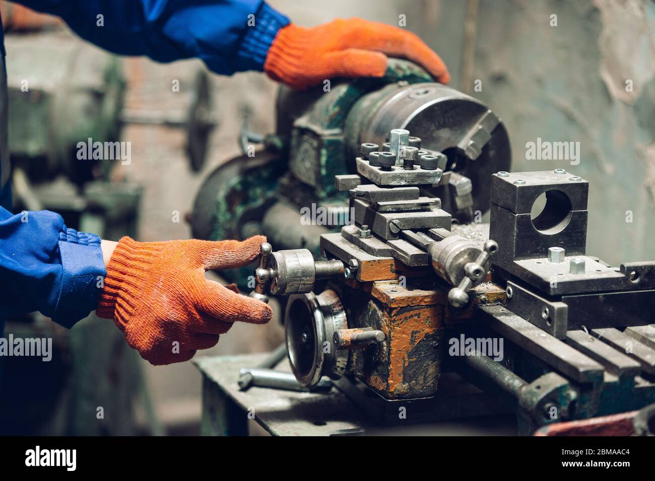 Closeup of repairman in uniform, professional builder working using ...