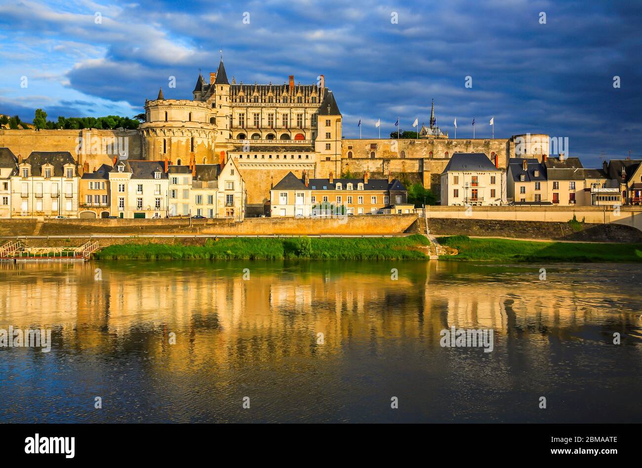 View of the Royal Chateau and river at sunset, Amboise, Main-et-Loire ...