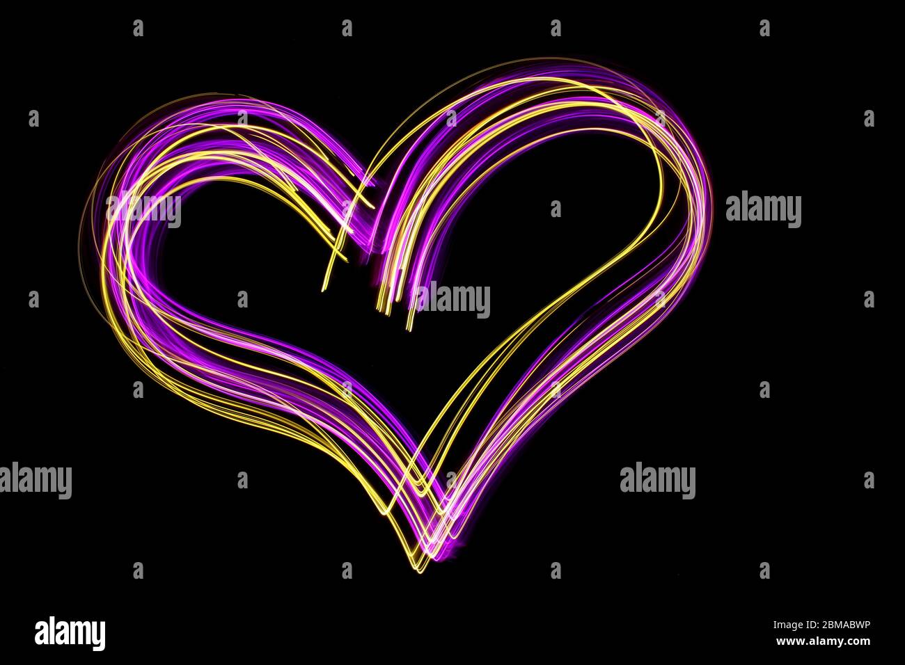 Long exposure photograph of neon colour in an abstract swirl, parallel ...