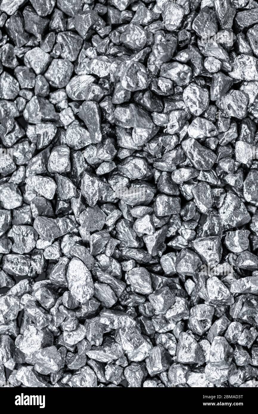 Heap of silver nuggets (close up shot) for use as background or texture ...