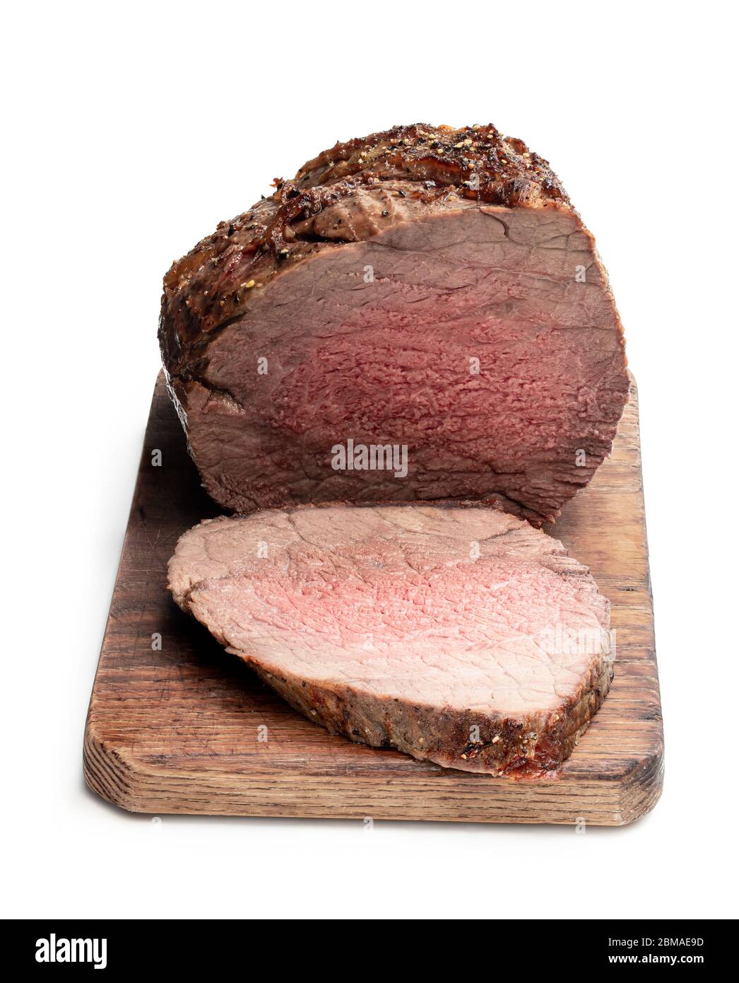 Roast beef isolated on white background Stock Photo - Alamy