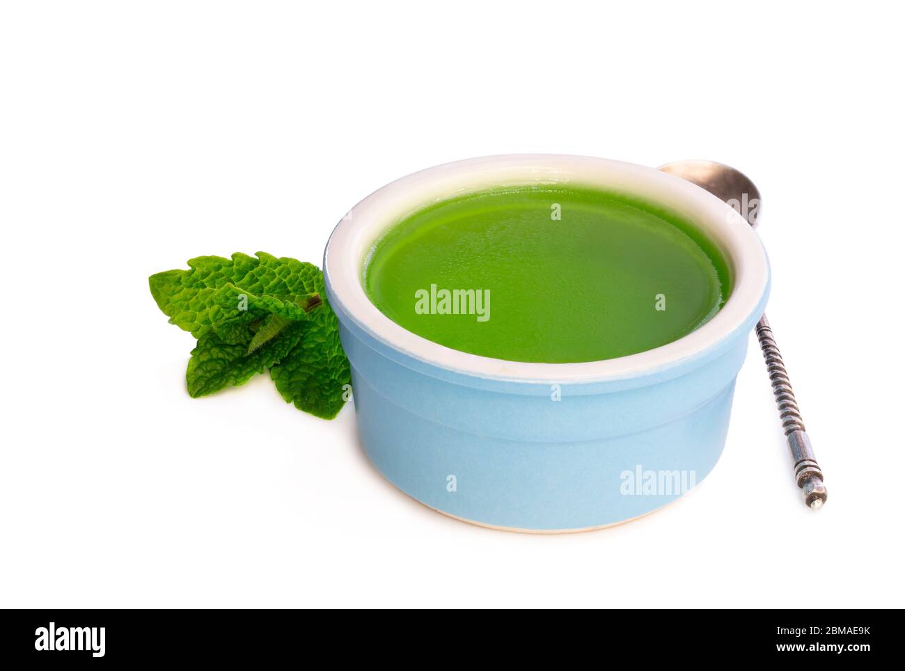 Mint jelly in small pot isolated on white Stock Photo - Alamy